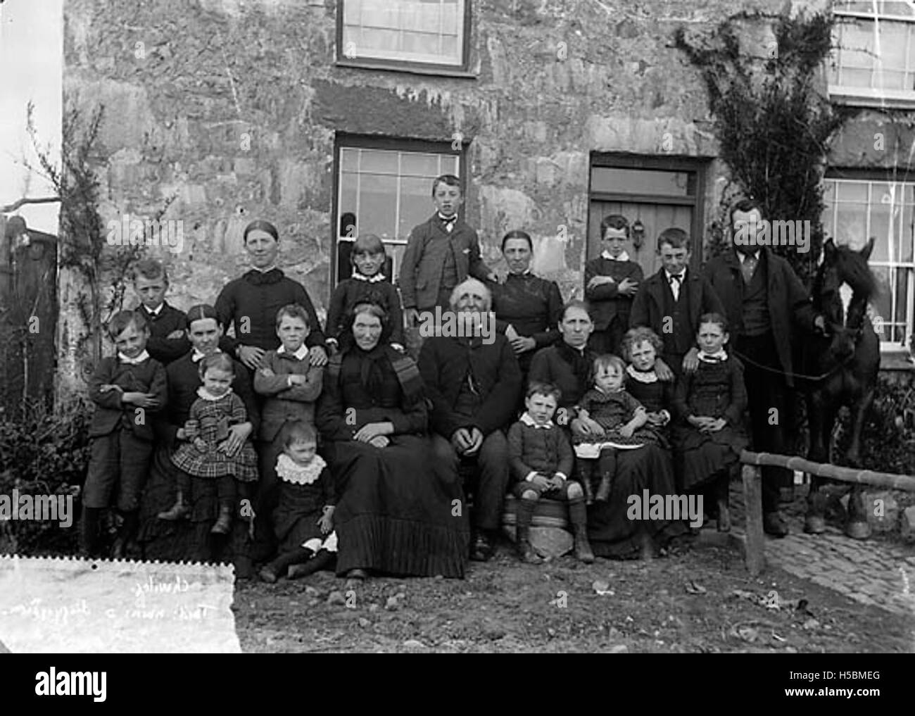 A large family group is pictured in Chwilog, a village in Wales ...