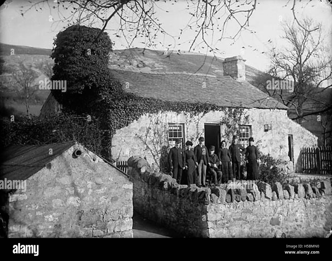 A photograph showing the Williams family standing in front of their ...