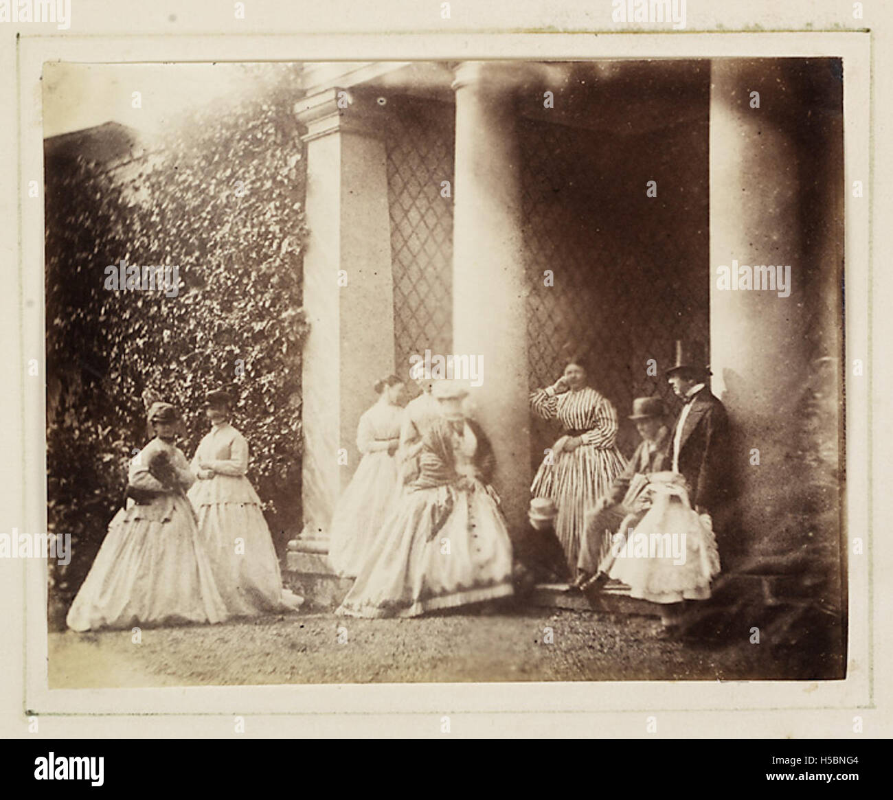 Calvert Richard Jones is pictured with six women, a man, a boy, a girl ...