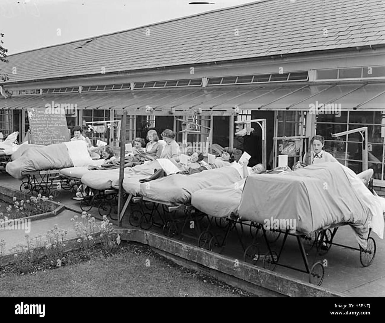 A group of patients at Gobowen Orthopaedic Hospital participates in a ...
