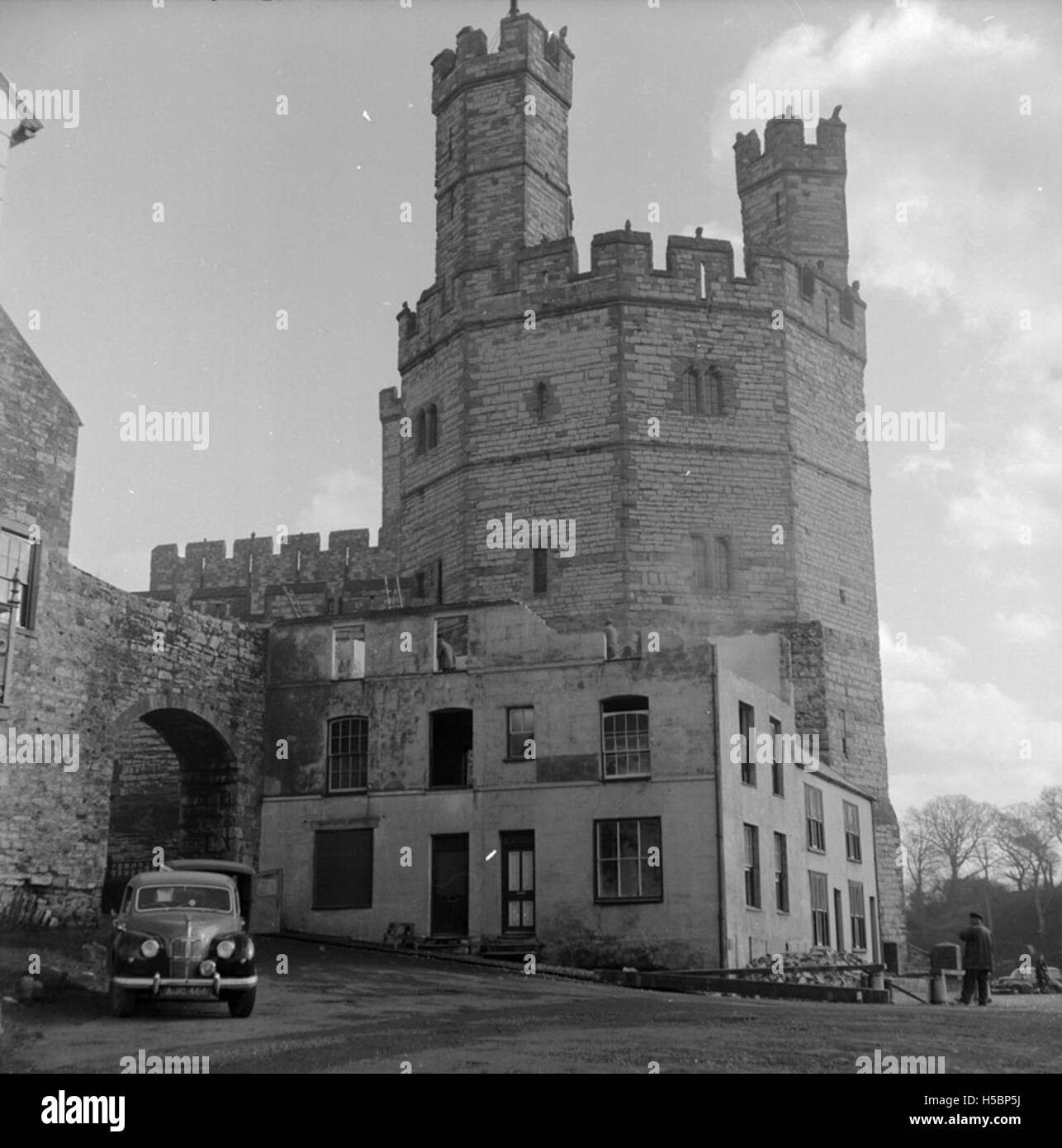 Demolition work to clear the buildings around Caernarfon Castle Stock ...