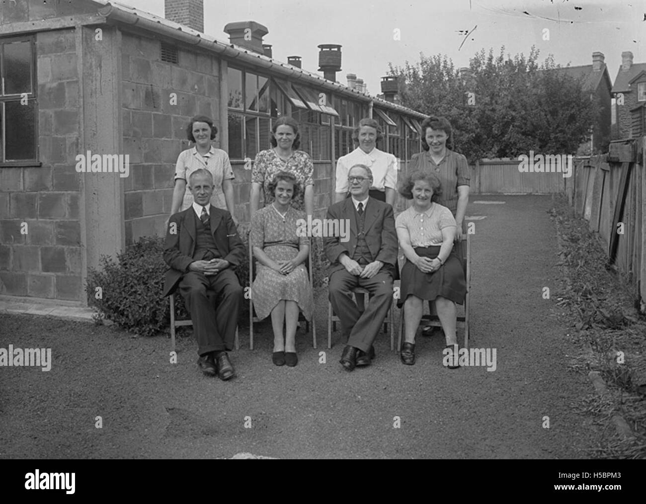 A group photograph featuring the headmaster and staff of Builth Wells ...