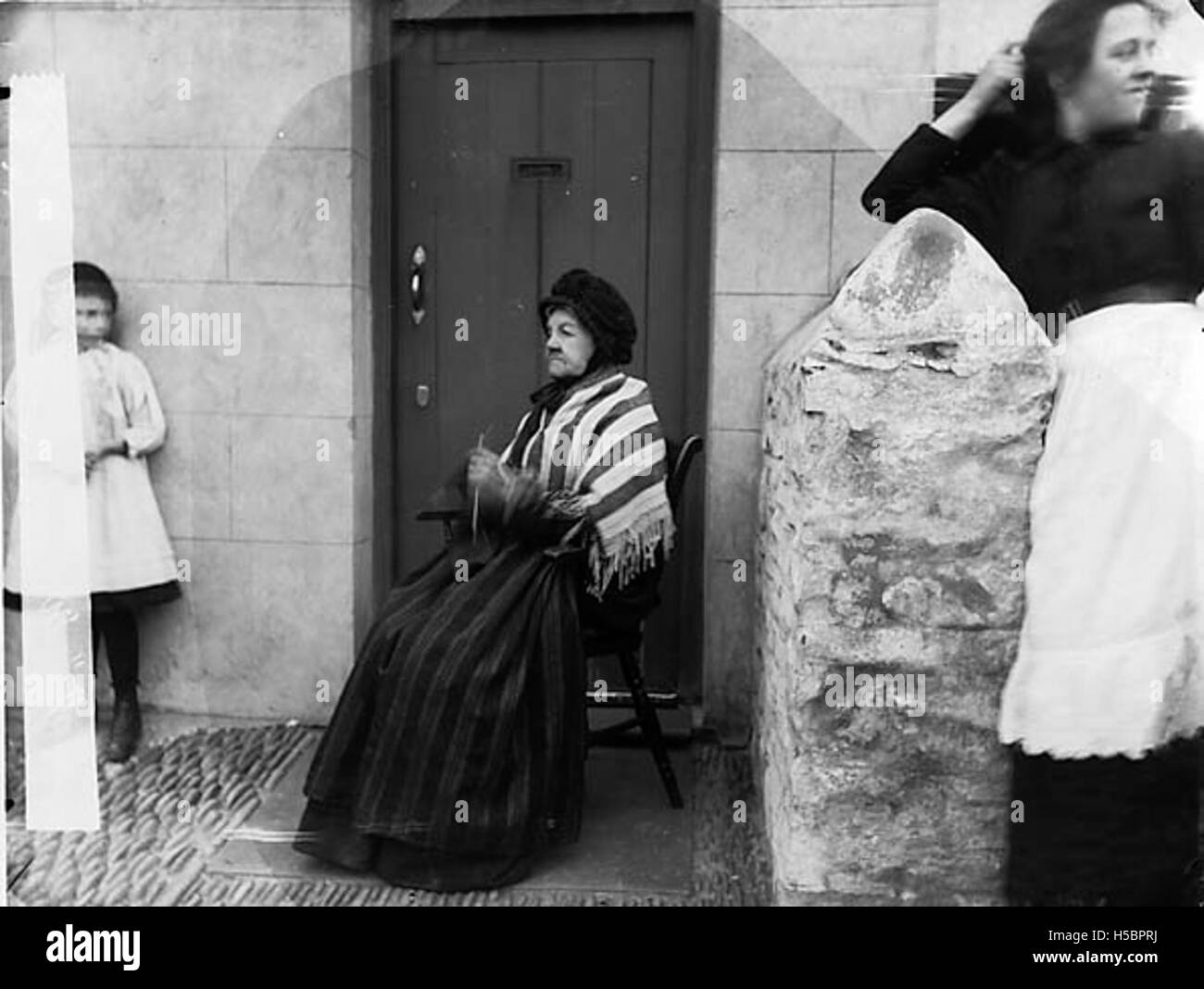 Mrs. Lewis is depicted at 84 years old, likely from Y Borth, Wales. The ...