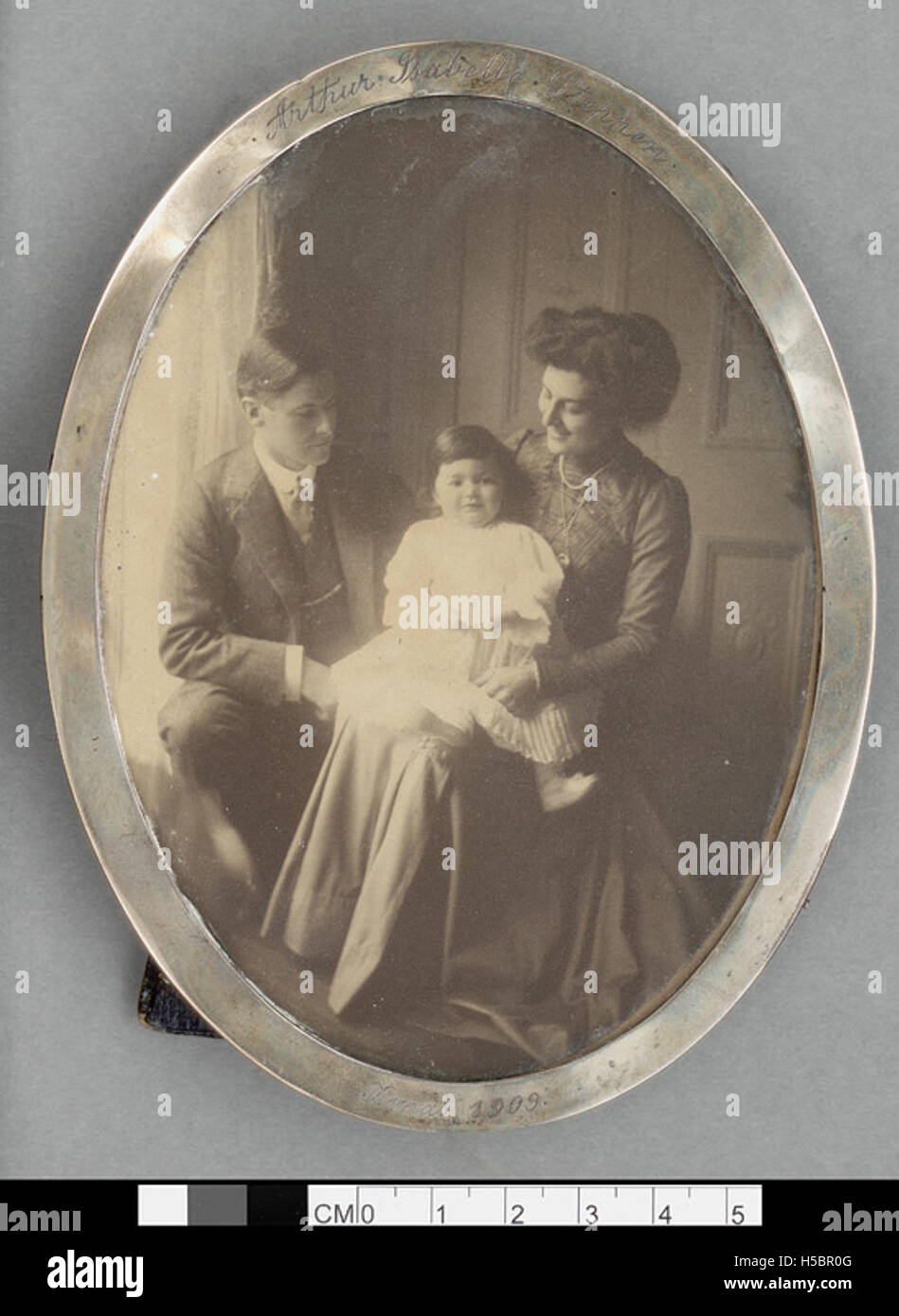 A portrait or photograph featuring three individuals: Arthur, Isabelle ...