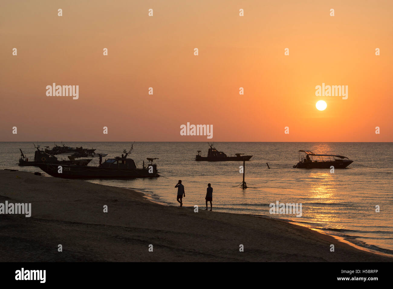 People walking on the beach at sunset, Talaimannar, Mannar Island, Sri ...