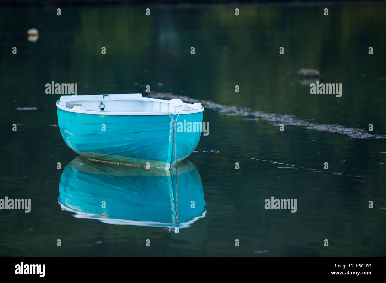 Solitary boat on the river at Devoran Cornwall Stock Photo - Alamy