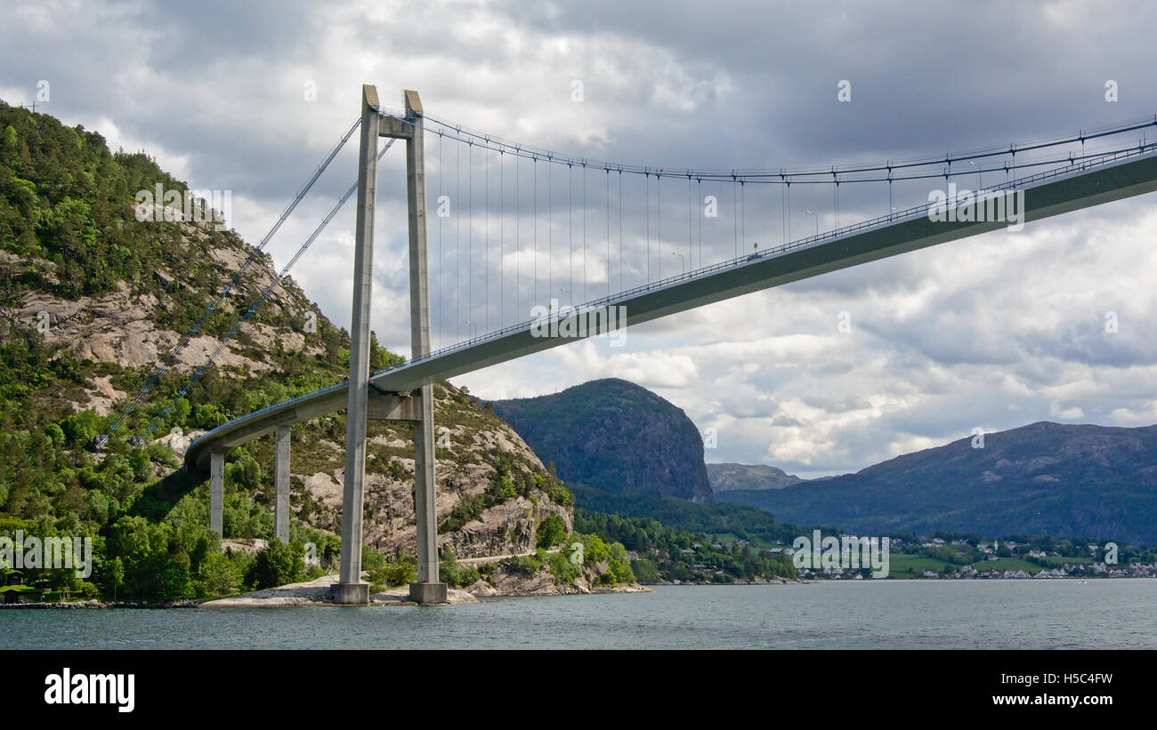 Suspension bridge in between mountains in Lysefjord, Norway Stock Photo ...