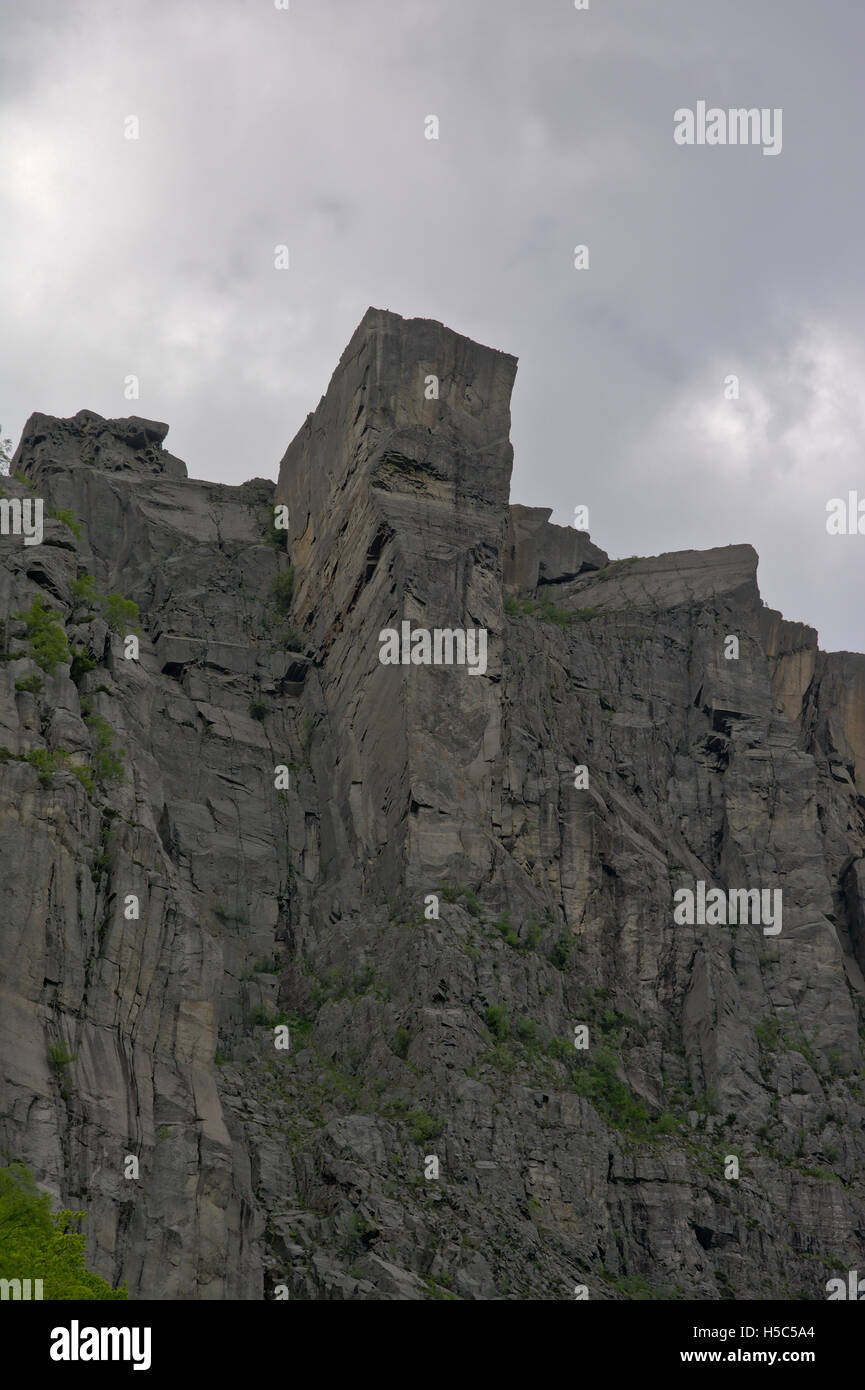 granite rock formation with a grey sky Stock Photo - Alamy