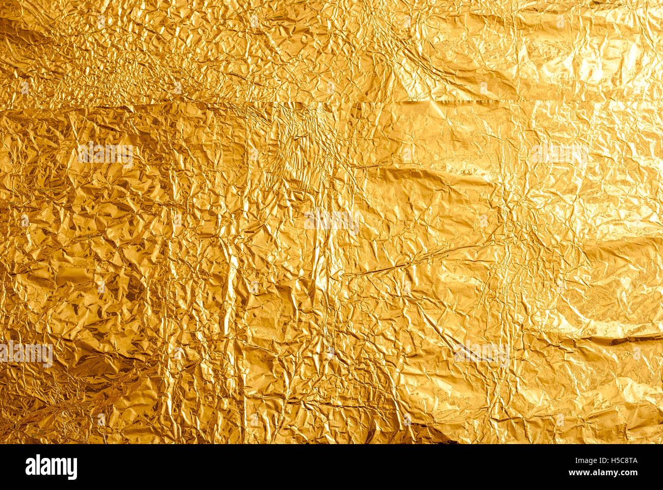 Gold foil figures Stock Photo - Alamy