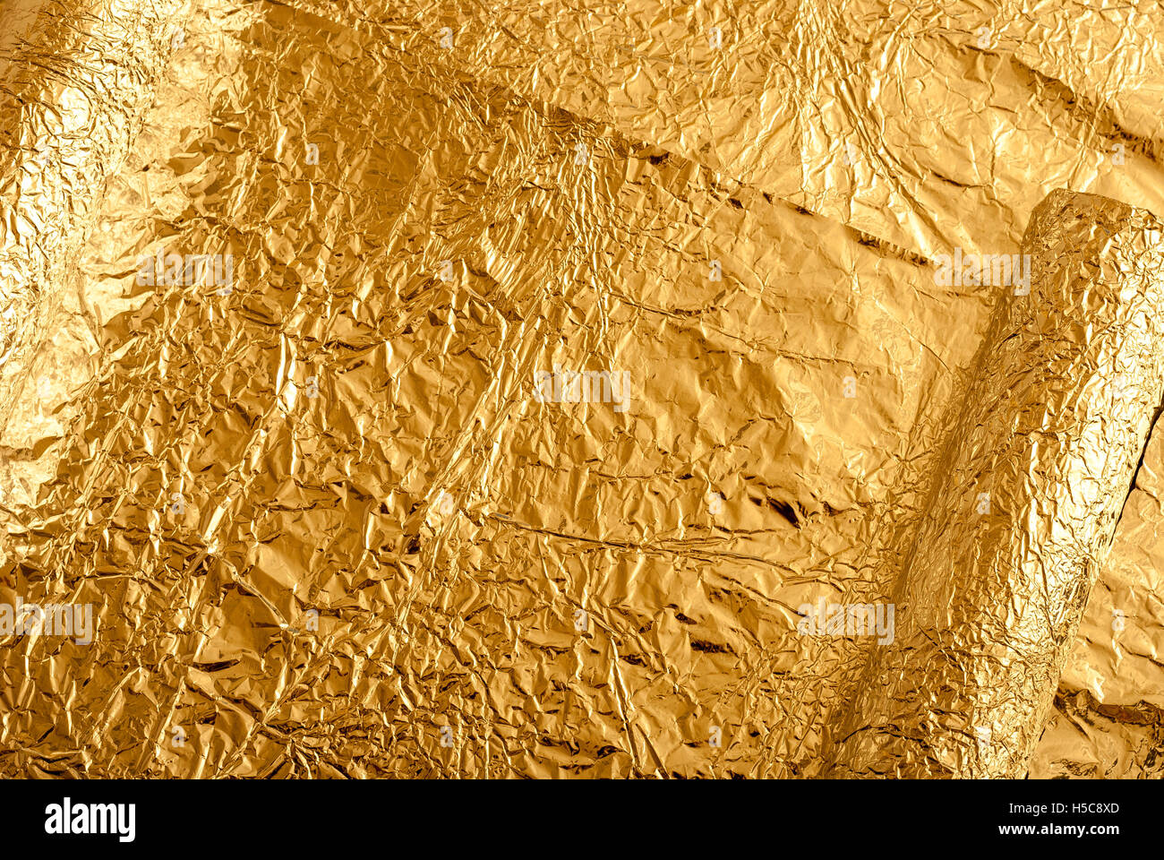 Gold foil figures Stock Photo - Alamy