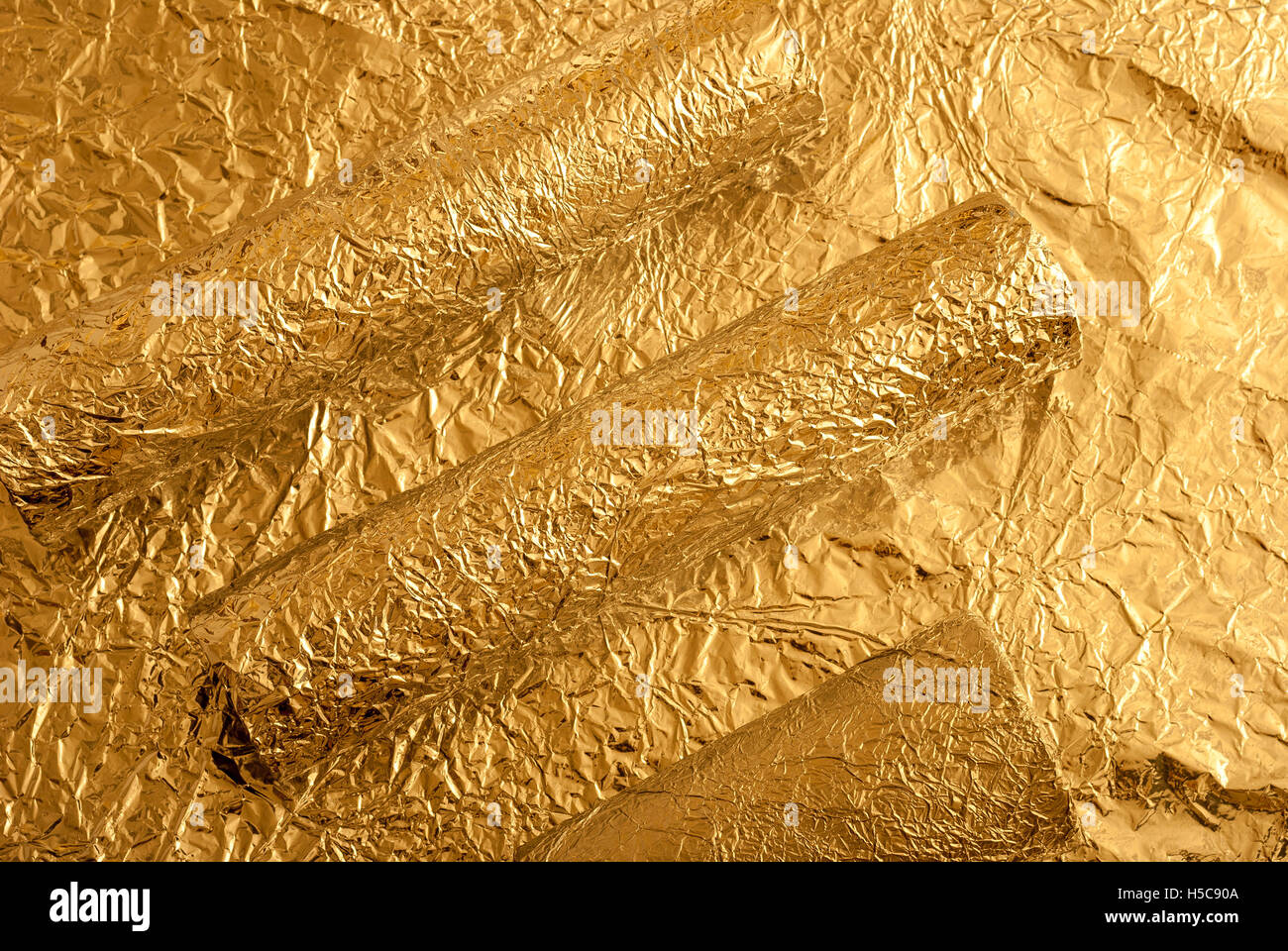 Shiny gold foil smooth hi-res stock photography and images - Alamy