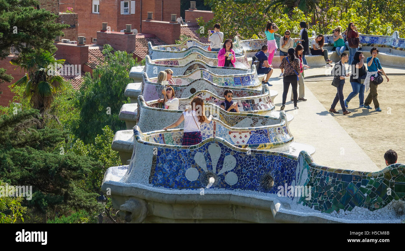 Typical Gaudi style mosaic benches at Park Guell in Barcelona Stock ...