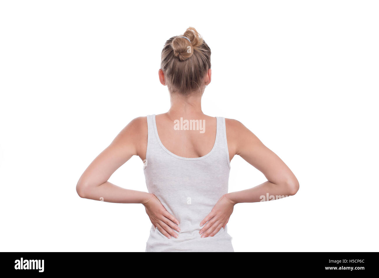 Woman with back pain, isolated on white background Stock Photo - Alamy