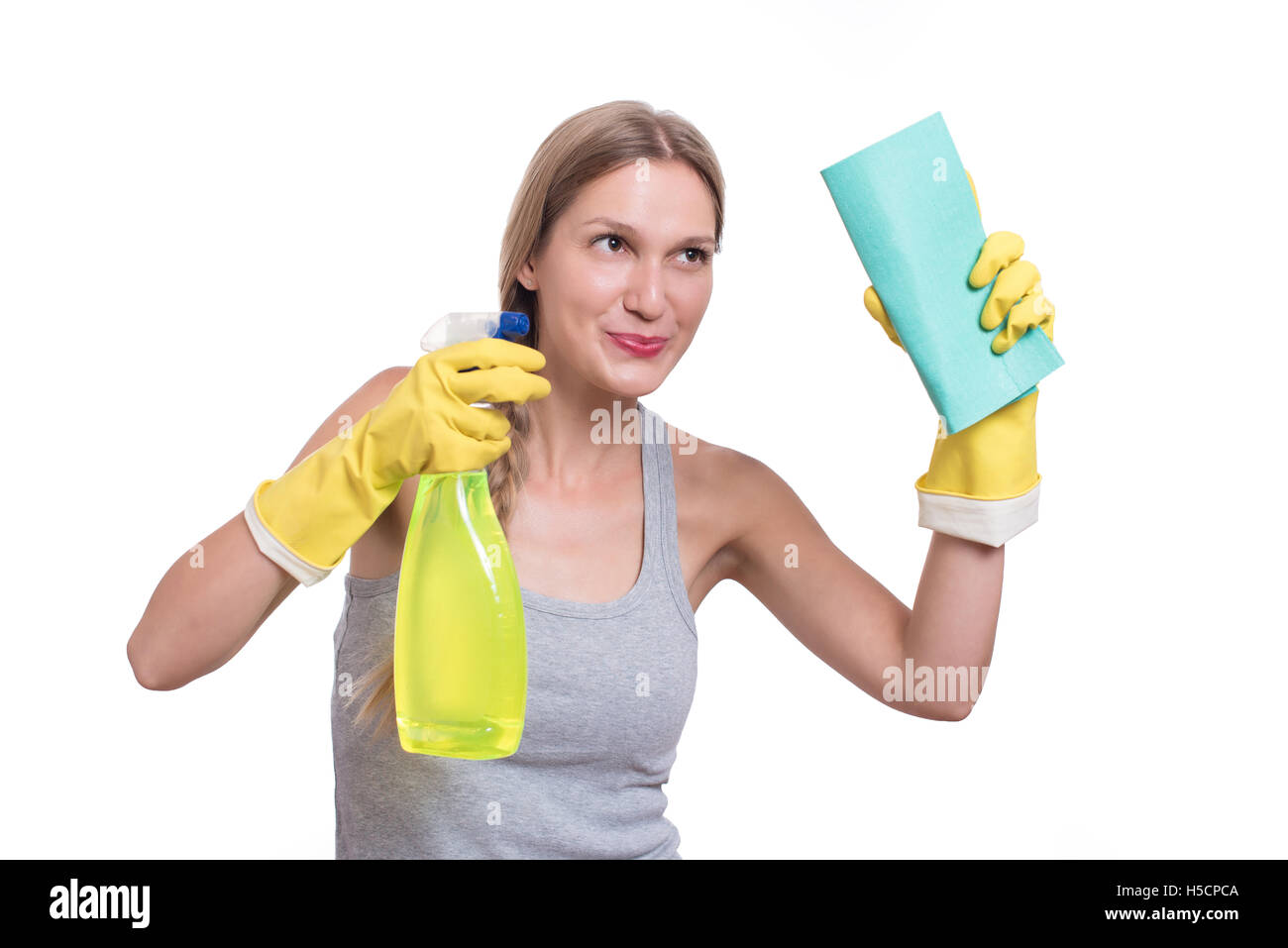Young cheerful woman cleaning with rag, isolated on white background ...