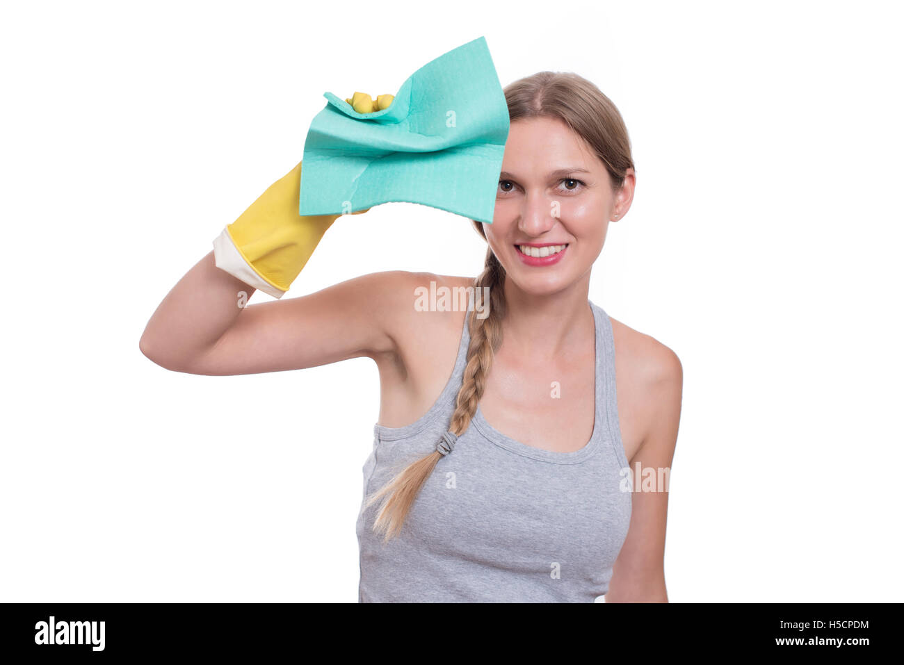 Young cheerful woman cleaning with rag, isolated on white background ...