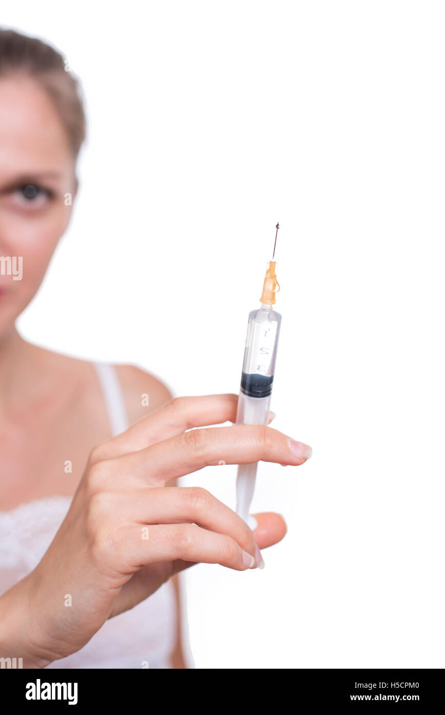 Syringe. Woman holding medical injection in hand, palm or fingers Stock ...