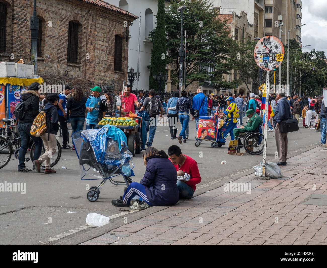 Bogota, Colombia - May 01, 2016: People walking through the streets of ...