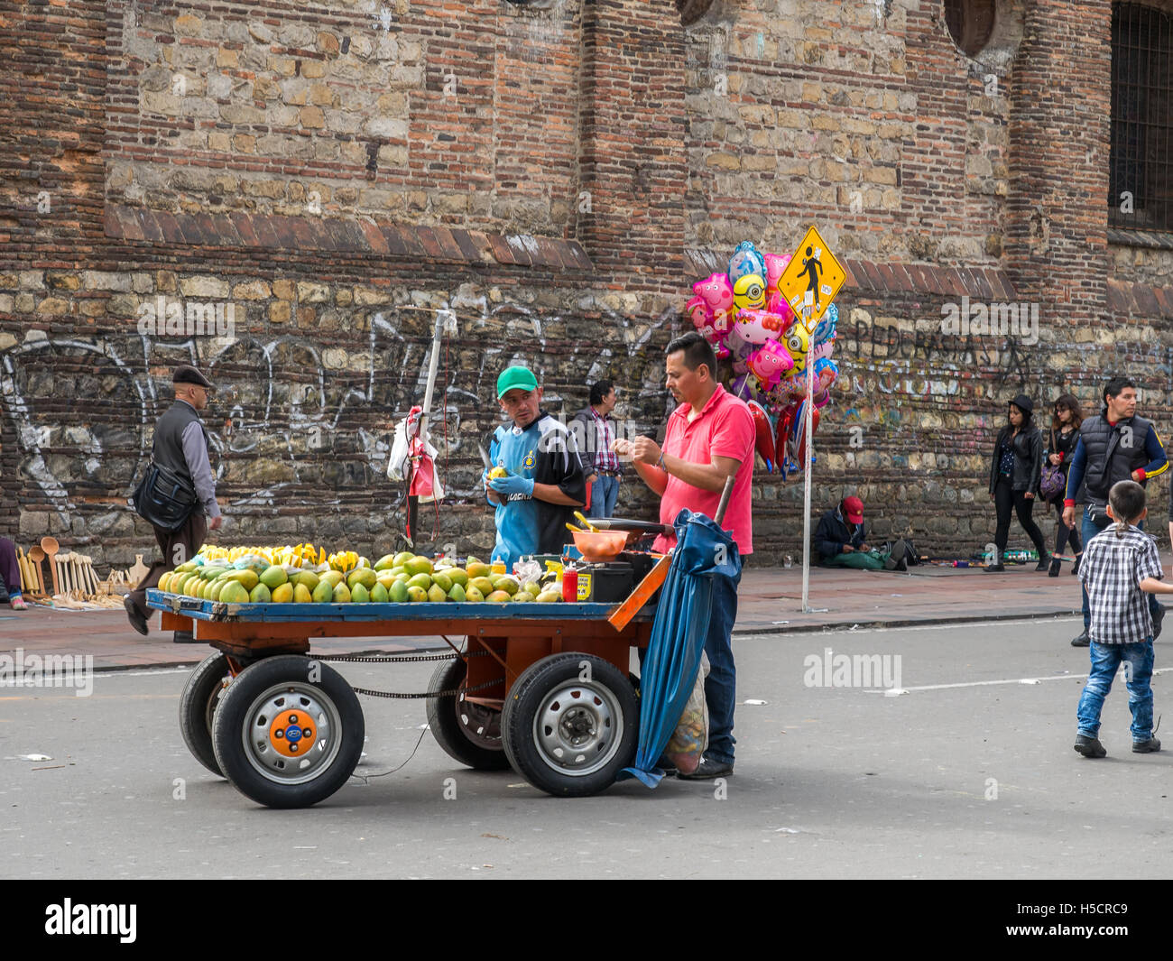 Bogota, Colombia - May 01, 2016: People walking through the streets of ...