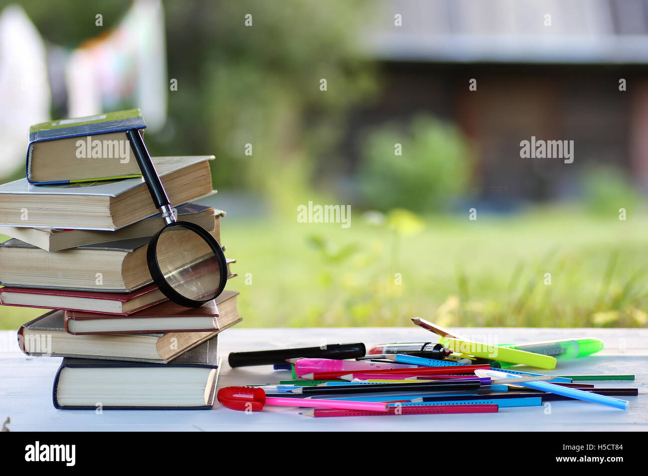 educaion book stack page outdoor Stock Photo - Alamy