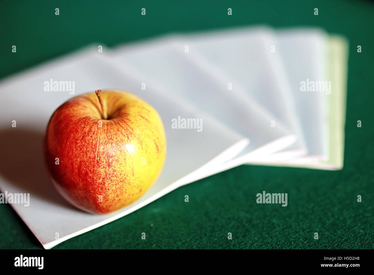 grunge effect photo education book stack apple pen Stock Photo - Alamy