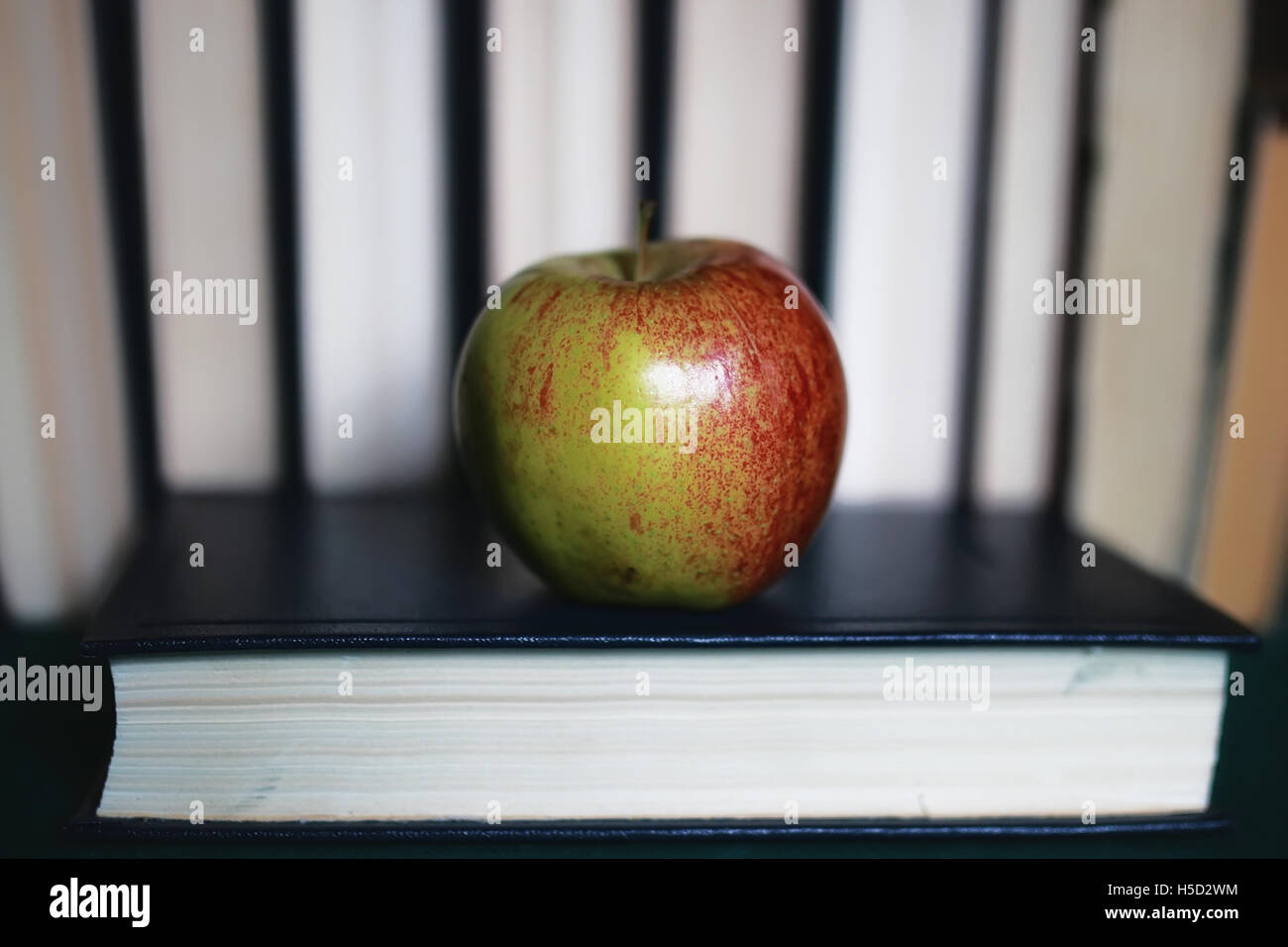 education concept books stack, apple and pen Stock Photo - Alamy