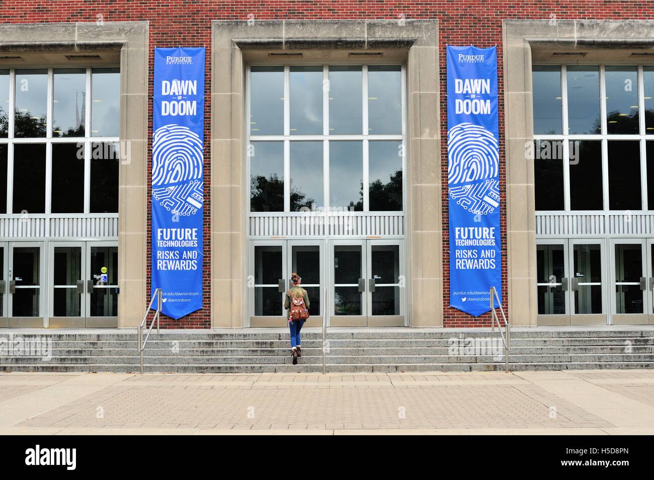 A lone student entering the Stewart Center on the campus of Purdue ...