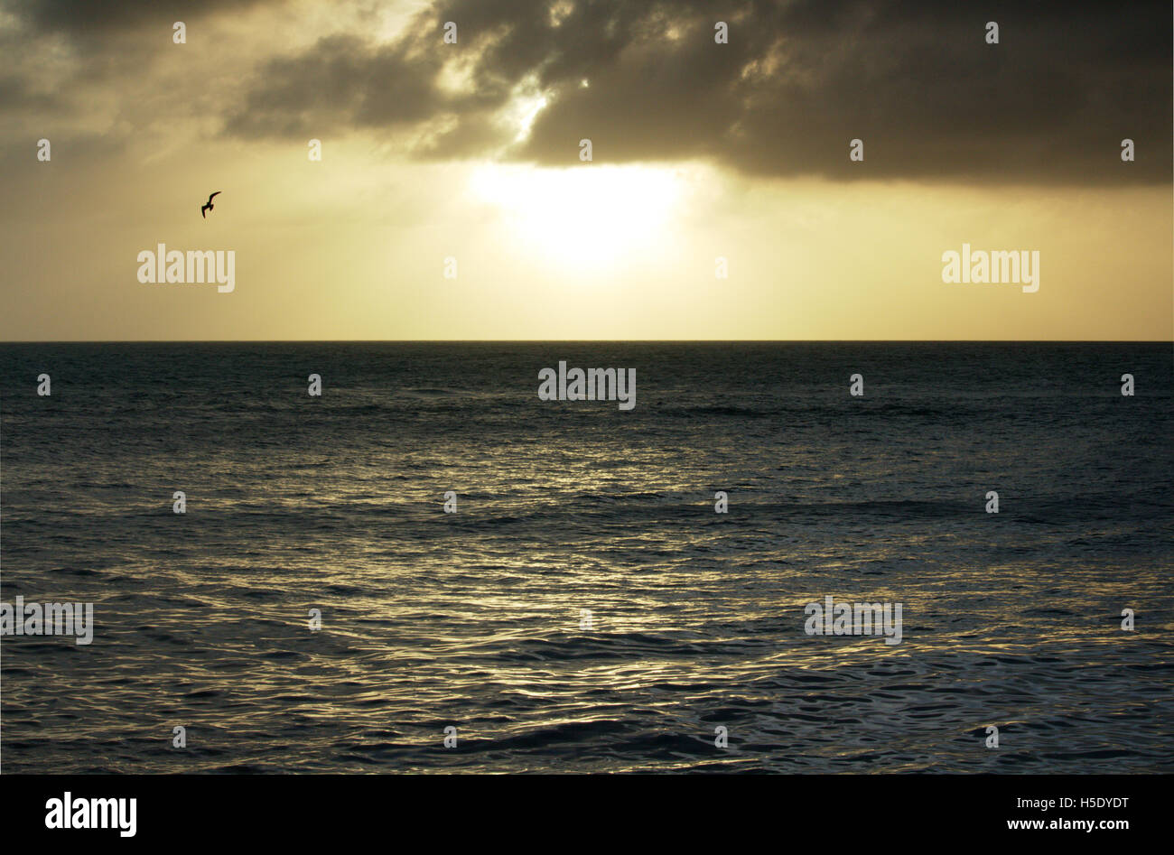 Sunsetting behind the clouds hi-res stock photography and images - Alamy