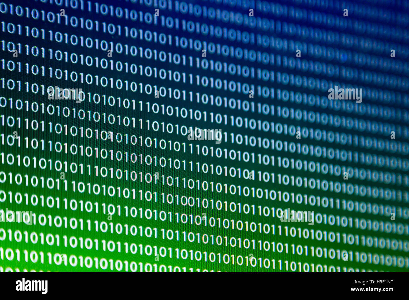 White numbers zero and one as a texture on a green, blue gradient ...