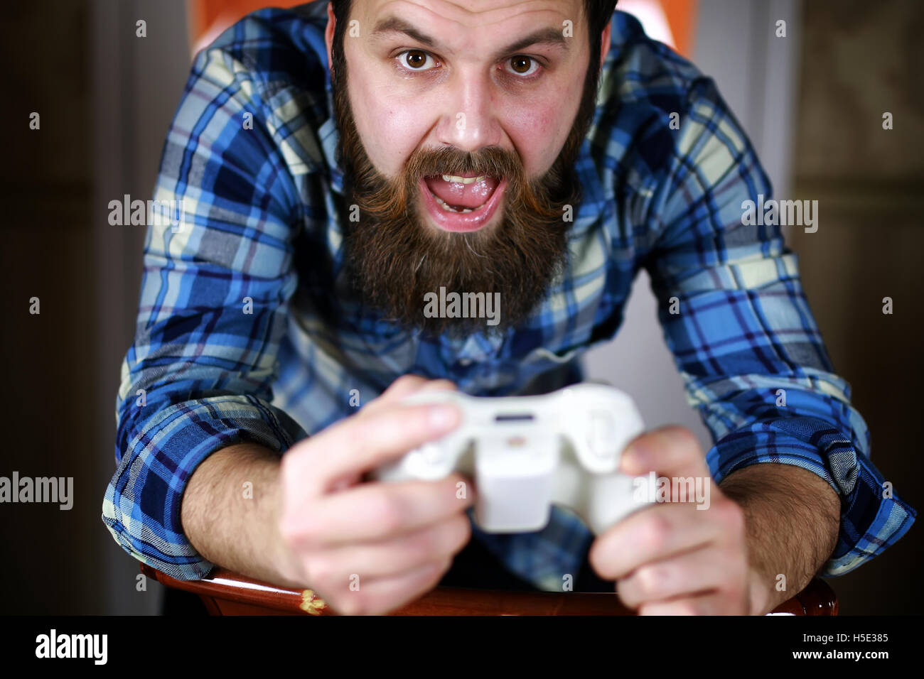 man bearded video game play Stock Photo - Alamy