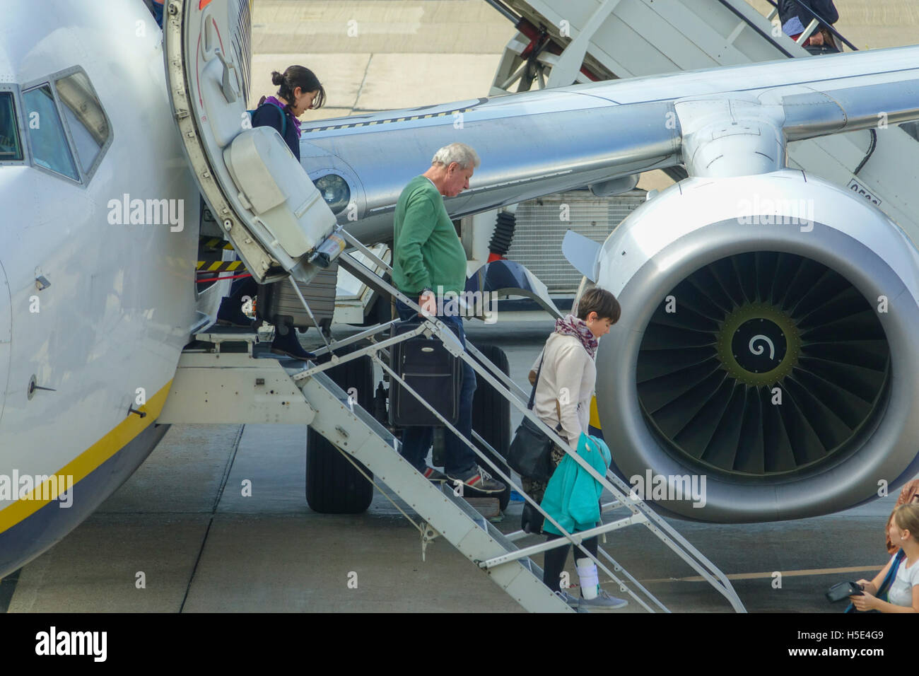 Tourists arriving at destination Stock Photo - Alamy