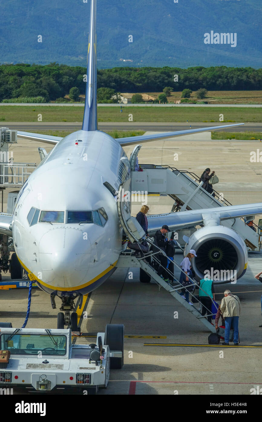 Deboarding passengers at the airport Stock Photo - Alamy