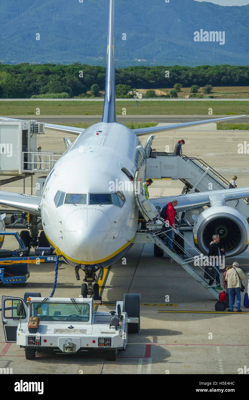 Deboarding passengers at the airport Stock Photo - Alamy