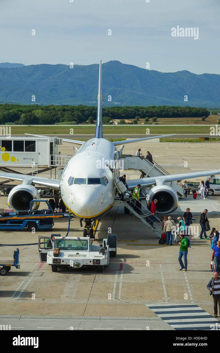 Deboarding passengers at the airport Stock Photo - Alamy
