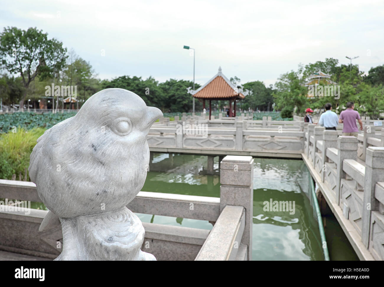 Bird stone statue Stock Photo - Alamy