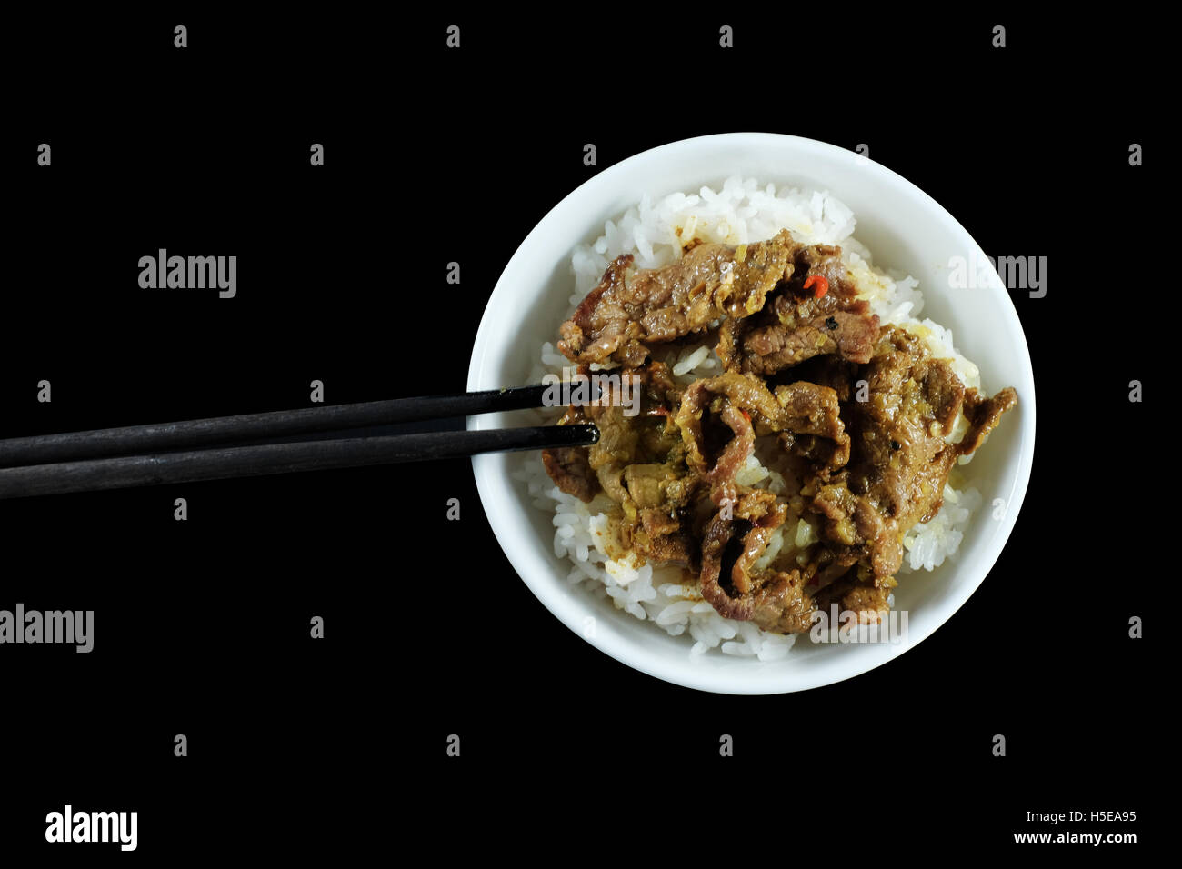 Rice with beef cooked with sauce Stock Photo - Alamy