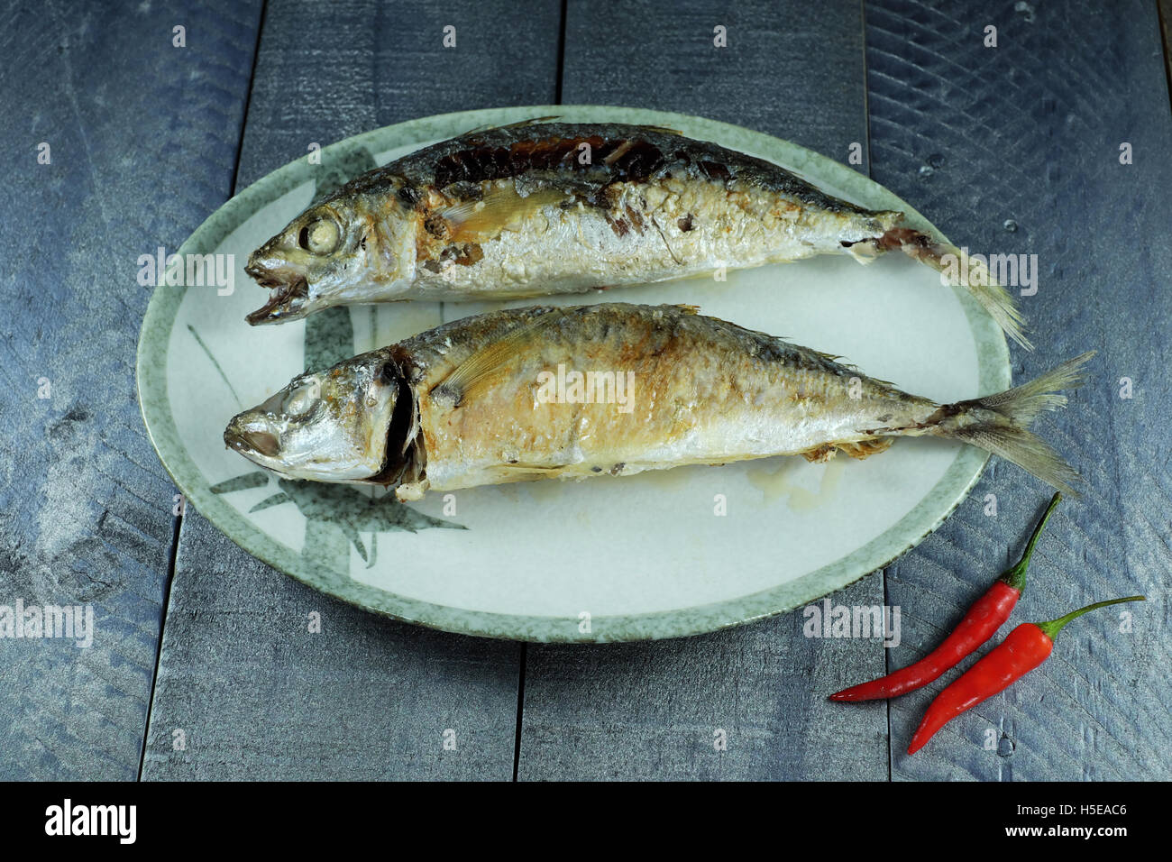 Fried steam fish Stock Photo - Alamy