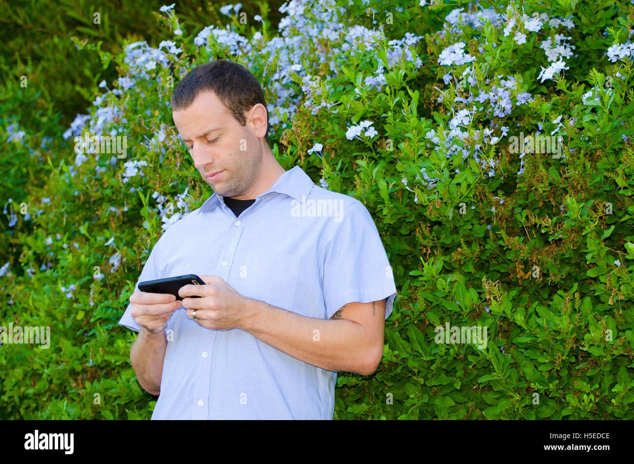 Male on a smart phone hi-res stock photography and images - Alamy