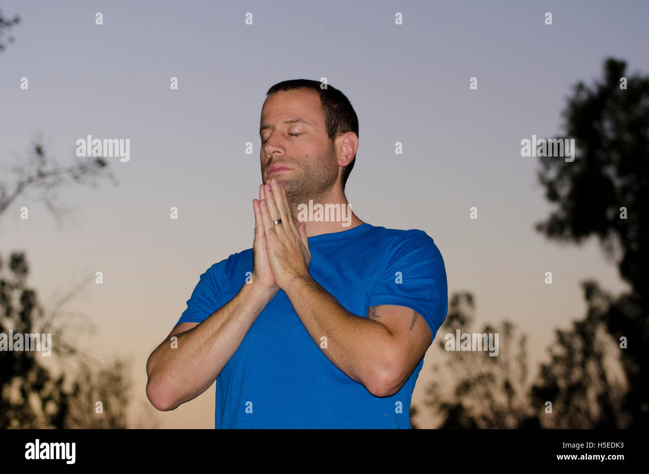 Man praying night hi-res stock photography and images - Alamy