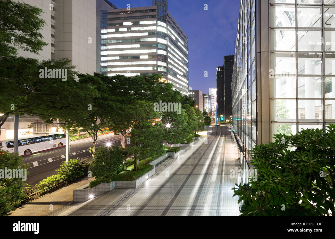 modern office buildings in tokyo at twilight from empty footpath Stock ...