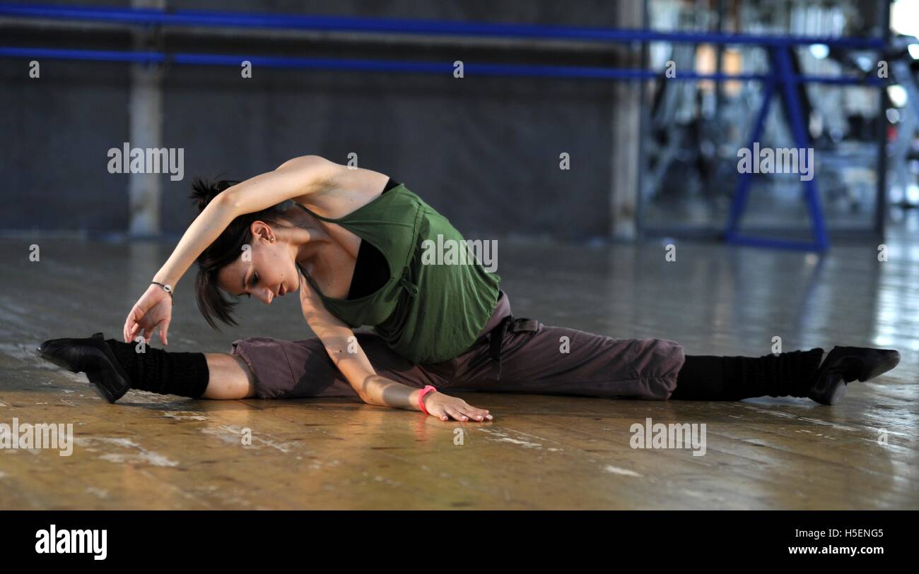 Sporty dancer girl dance, working out, doing fitness exercises with ...