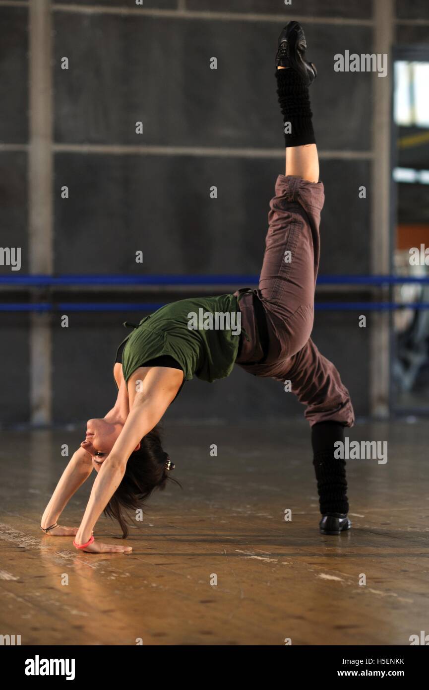 Sporty dancer girl dance, working out, doing fitness exercises with ...