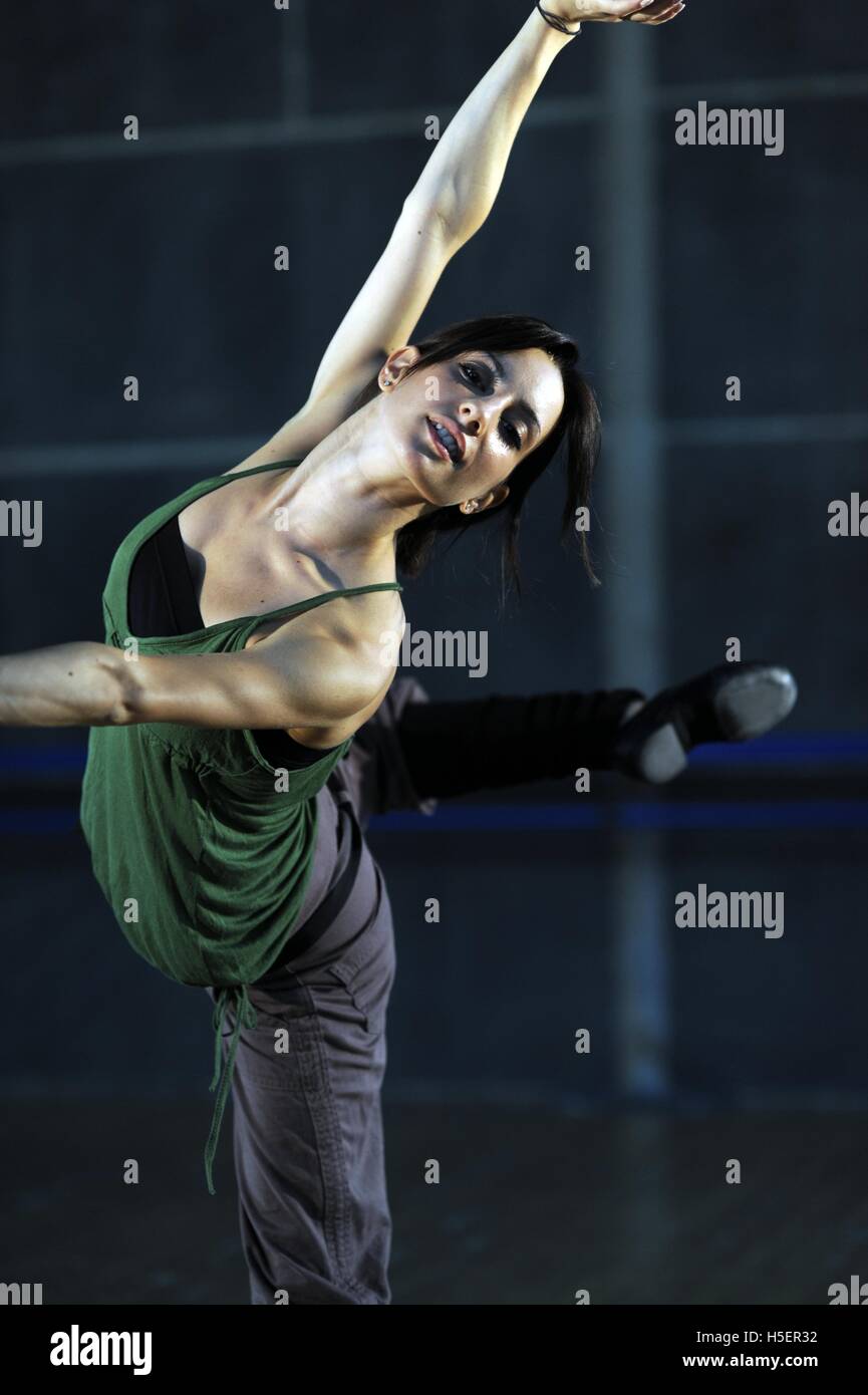Sporty dancer girl dance, working out, doing fitness exercises with ...