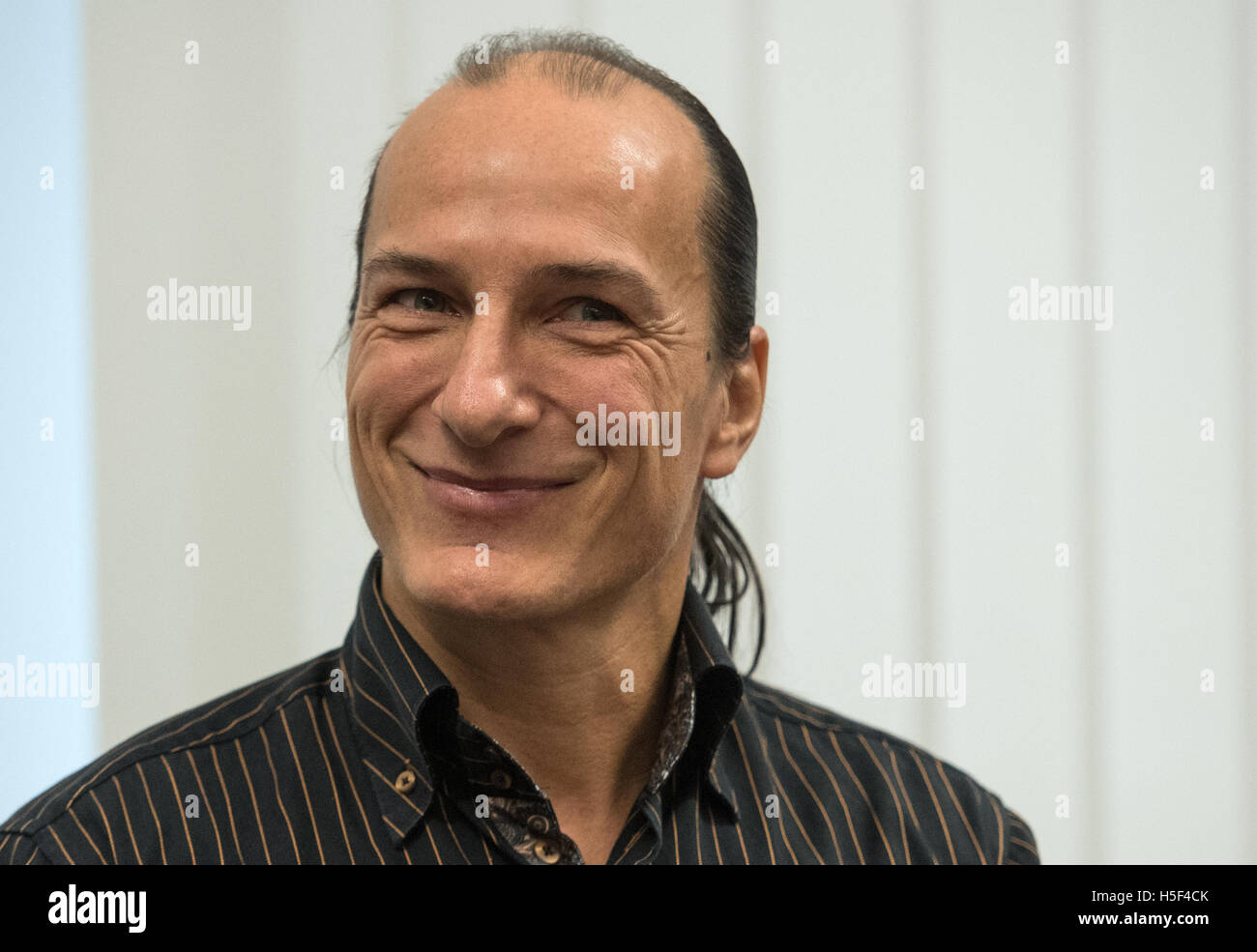The self-entitled 'King of Germany', Peter Fitzek, prepares for his ...