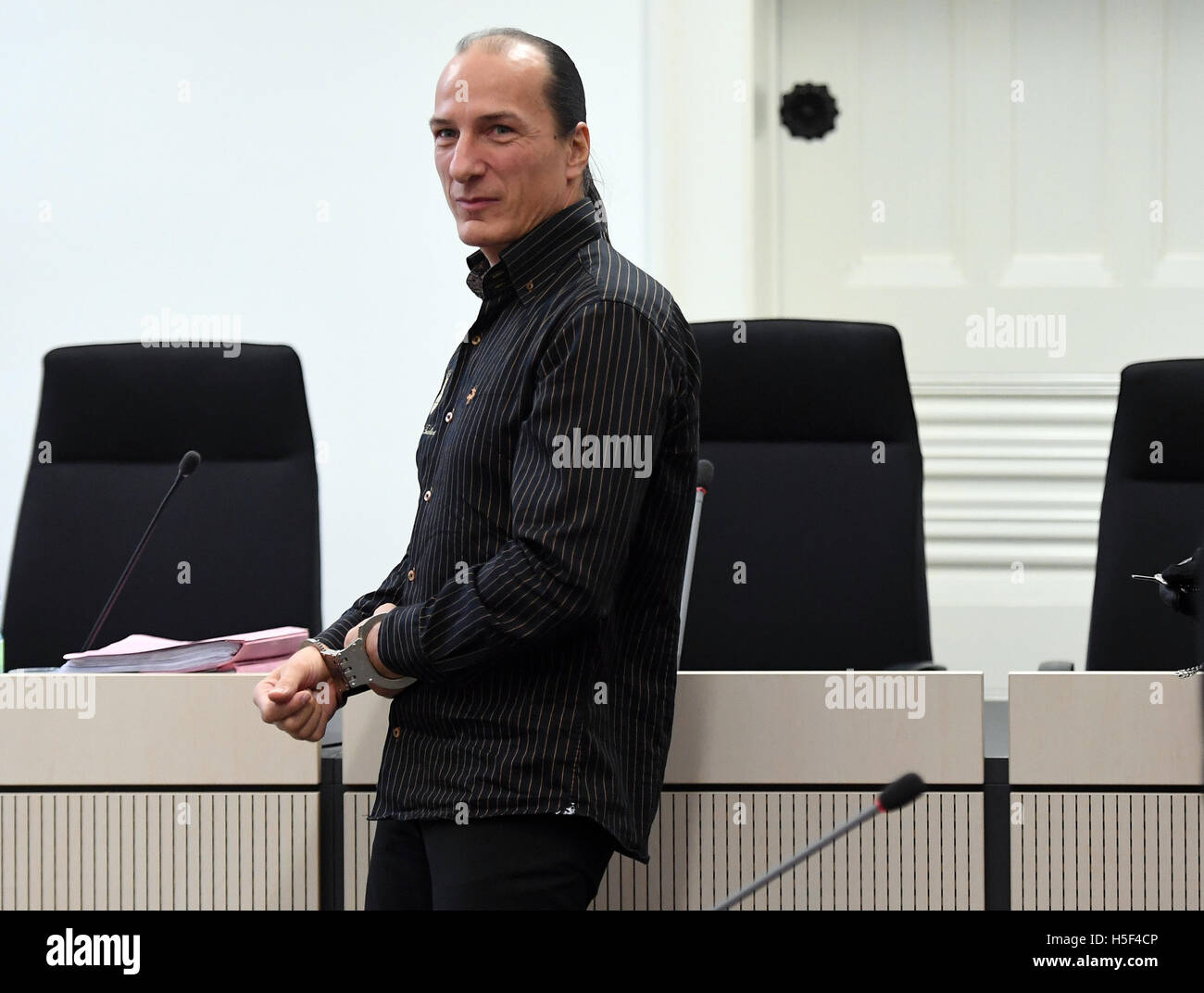 The self-entitled 'King of Germany', Peter Fitzek, entering the court ...