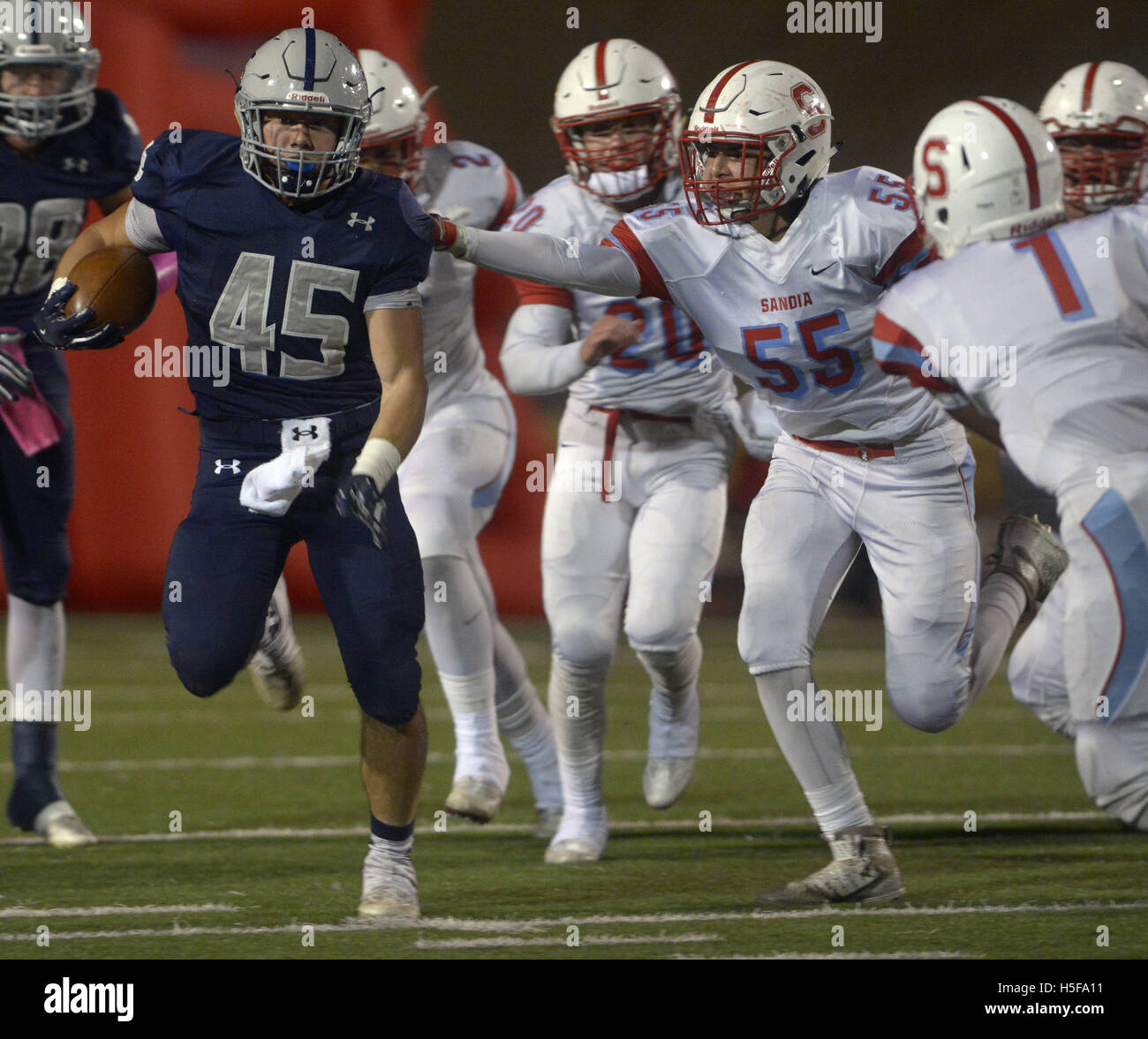 Usa. 20th Oct, 2016. SPORTS -- La Cueva's Josh Woisin, 45, slips by ...