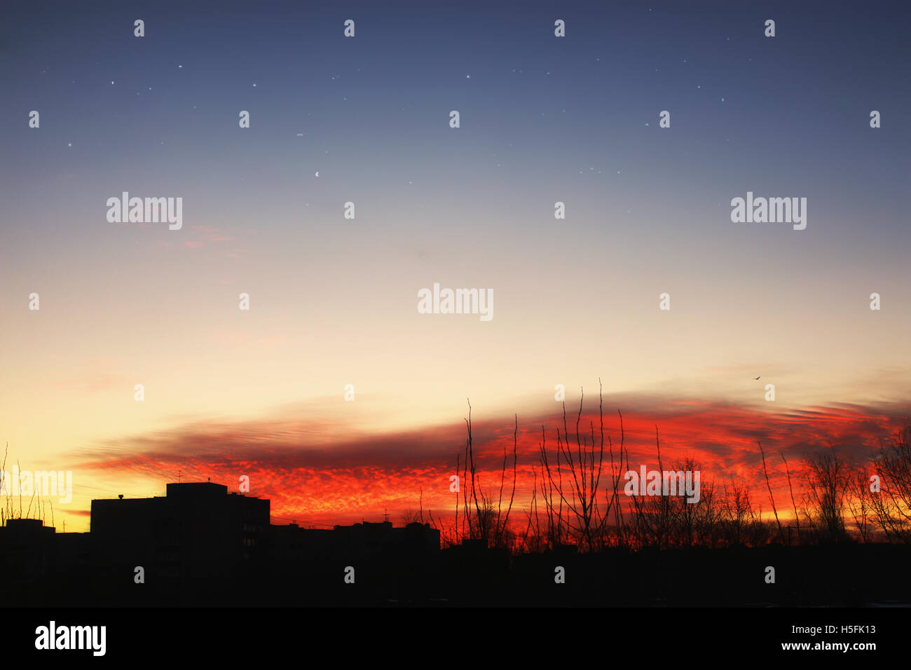 sunset sky stars silhouettes of buildings Stock Photo - Alamy