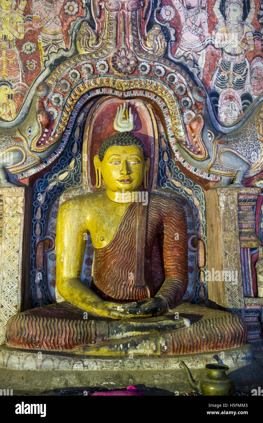 Interior of an ancient cave temple with Dambulla style paintings ...