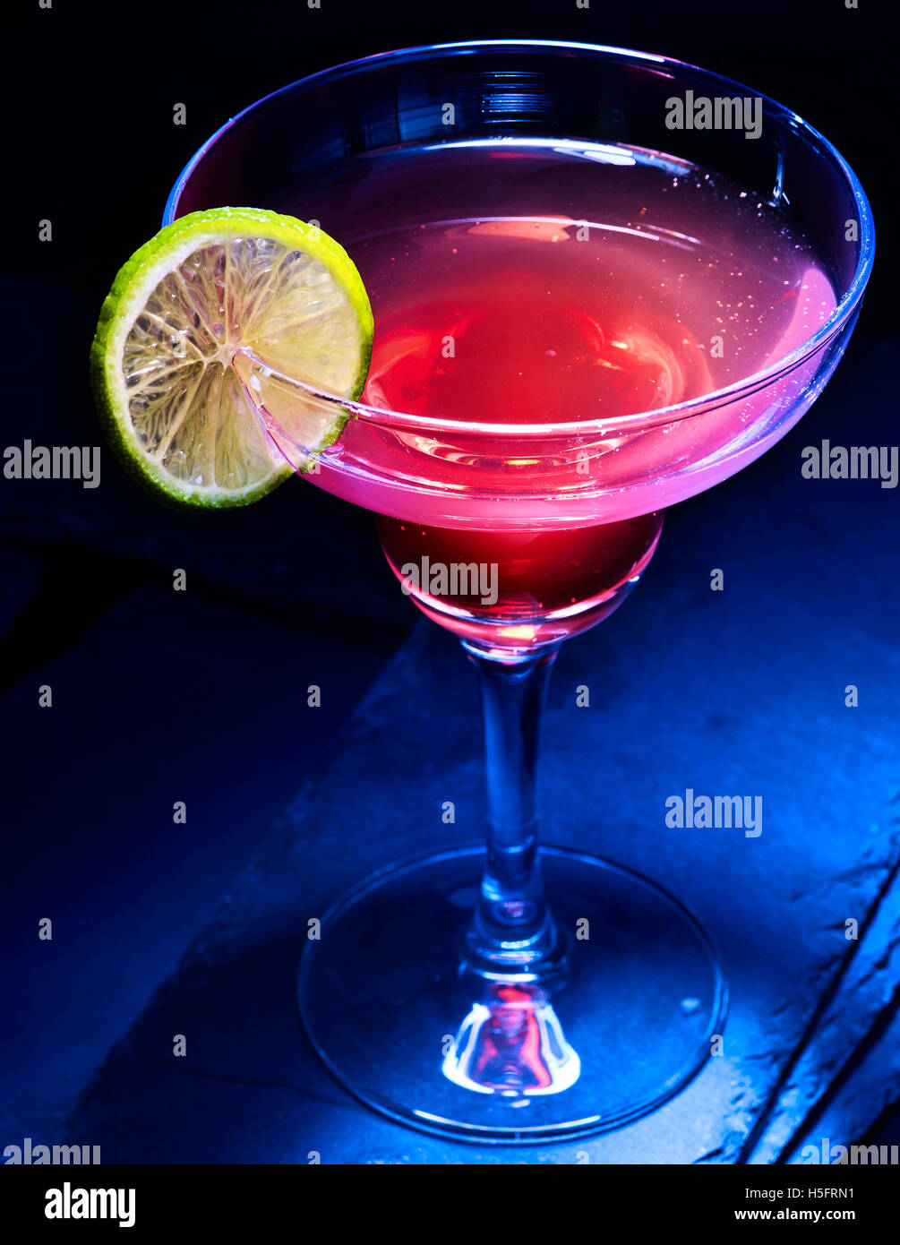 Berry alcohol cocktail on black background Stock Photo - Alamy