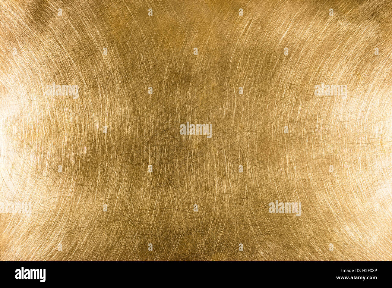 scratched industrial brass metal plate textured background pattern with ...