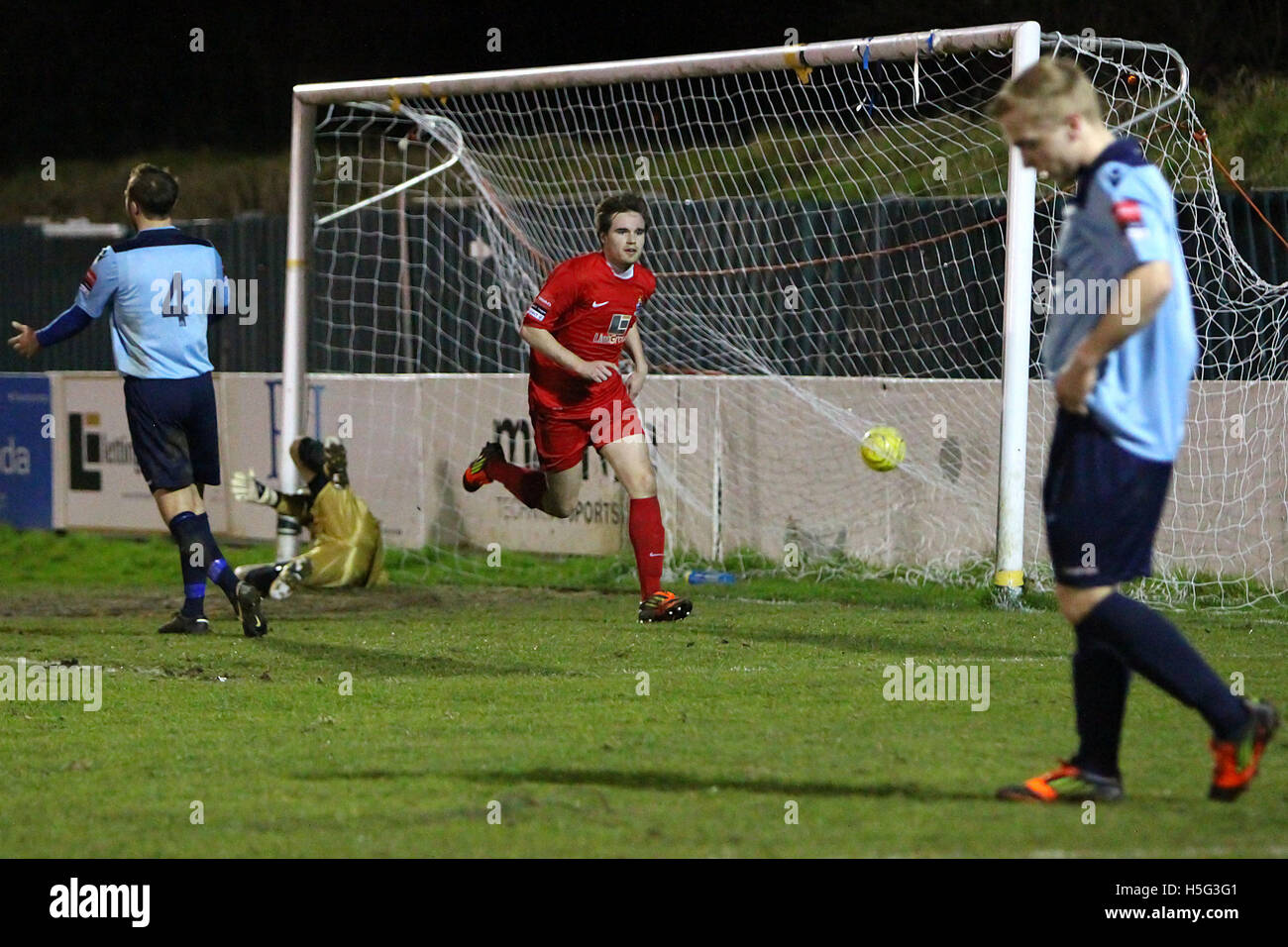 Daniel Charge scores the fourth goal for Barkingside and celebrates ...